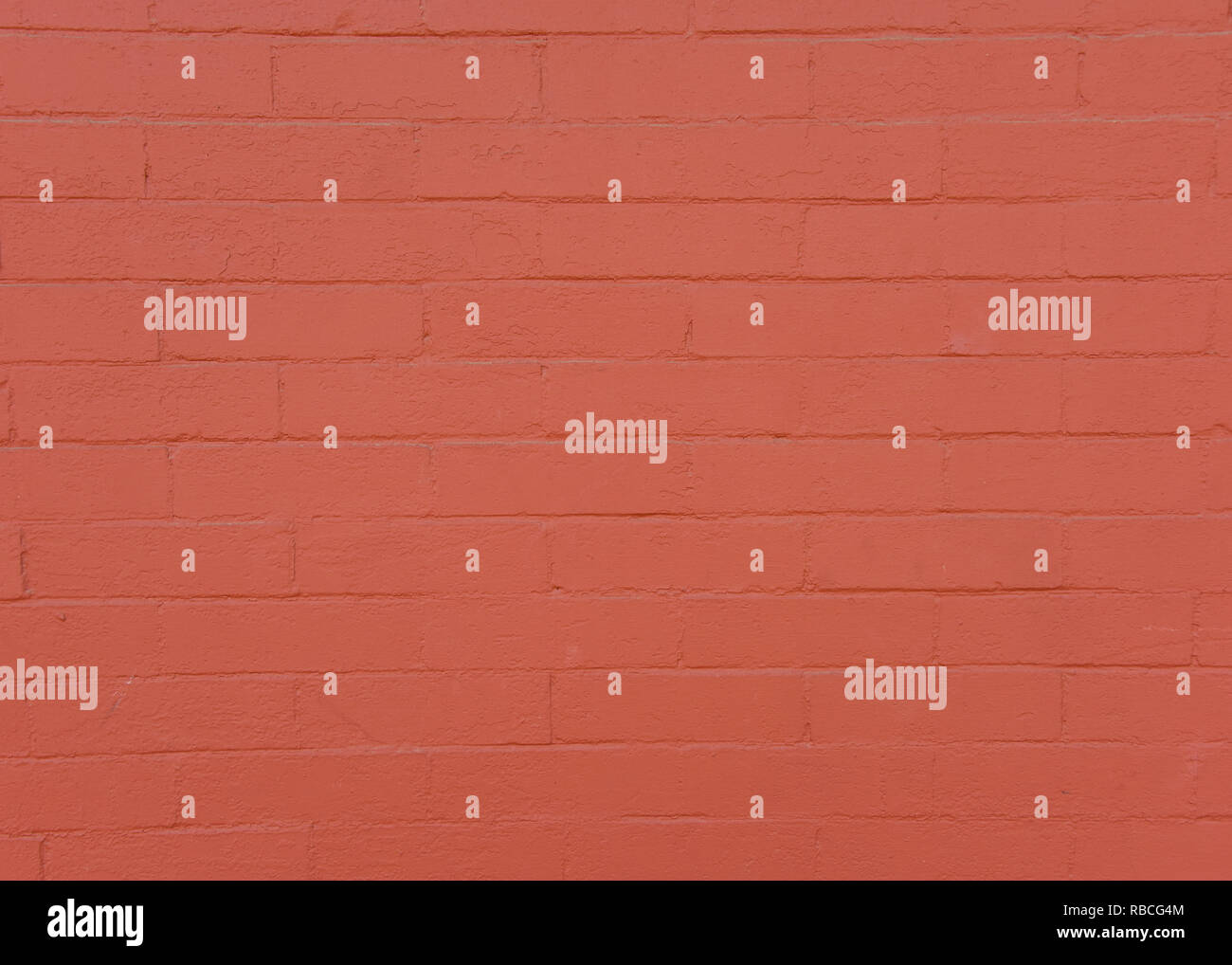 Red-painted Brick Wall Background Stock Photo - Alamy