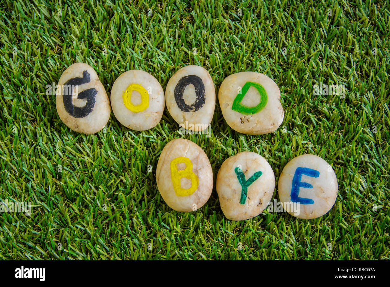 good bye paint on stone , on the grass Stock Photo - Alamy