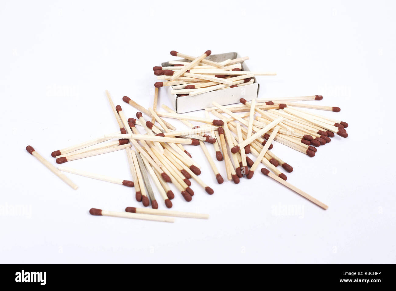 Assorted matchsticks with match box. Isolated on the white background ...
