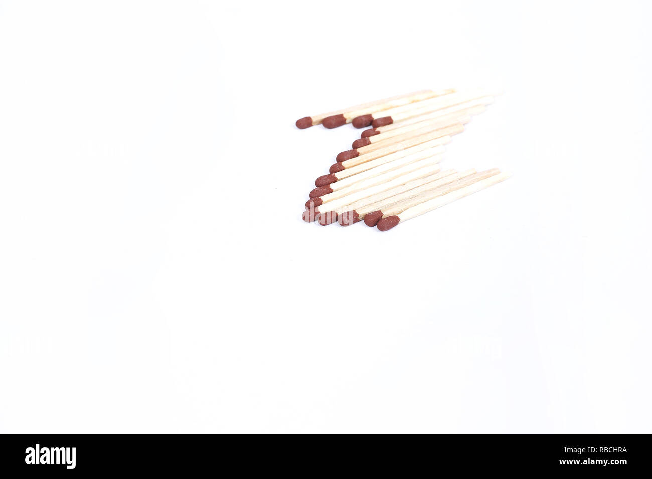 Collection of matchsticks with brown head.Isolated on the white ...
