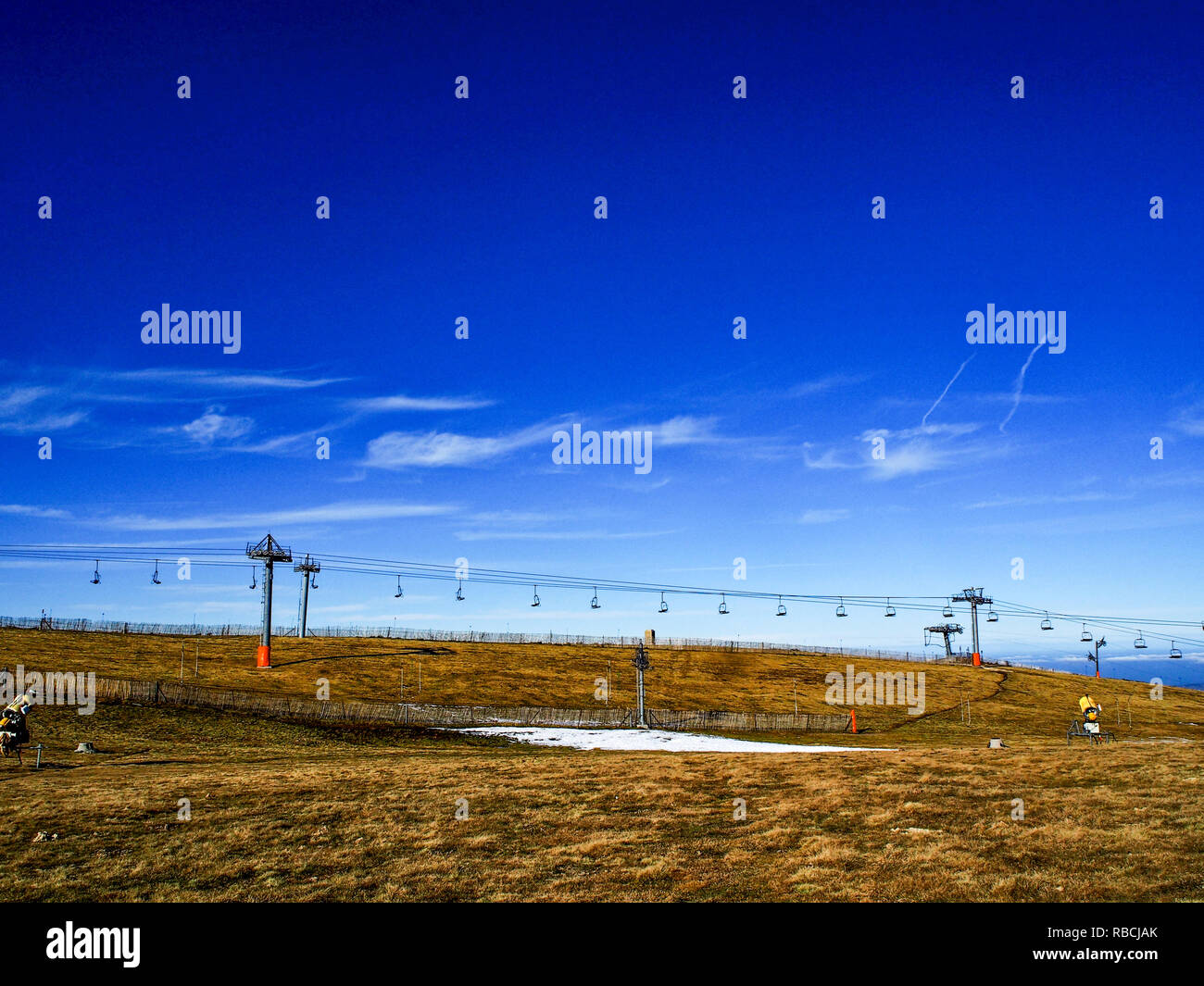 Ski lift without snow in ski station Stock Photo - Alamy