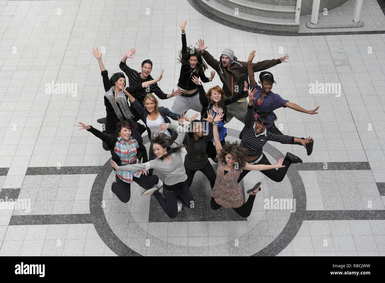 Teenagers hanging out together in Kingston-upon-Thames, Surrey, England ...