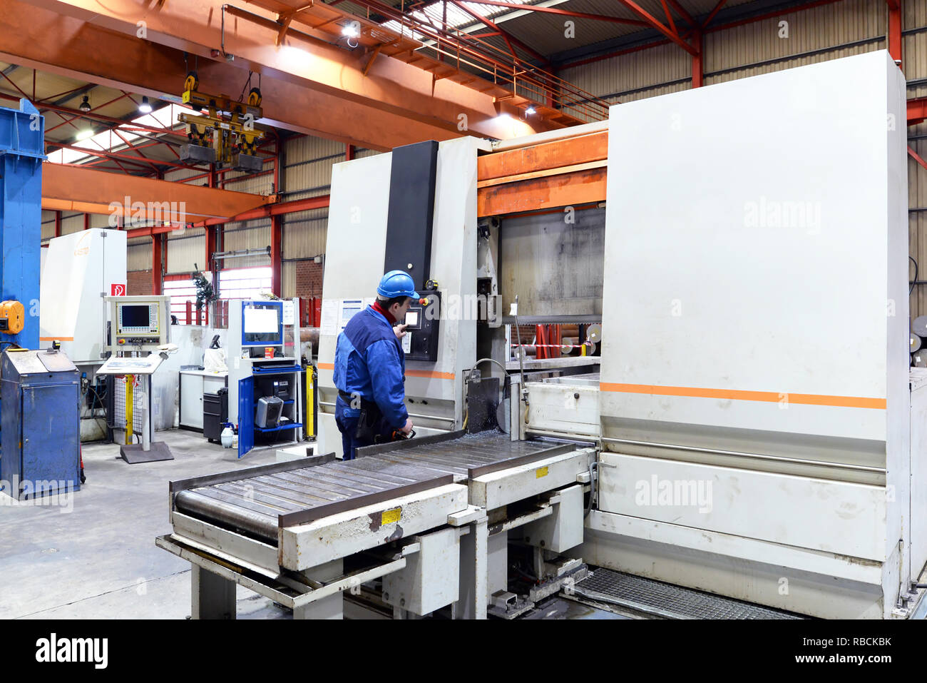 Sale and storage of industrial goods and steel in a factory hall Stock ...
