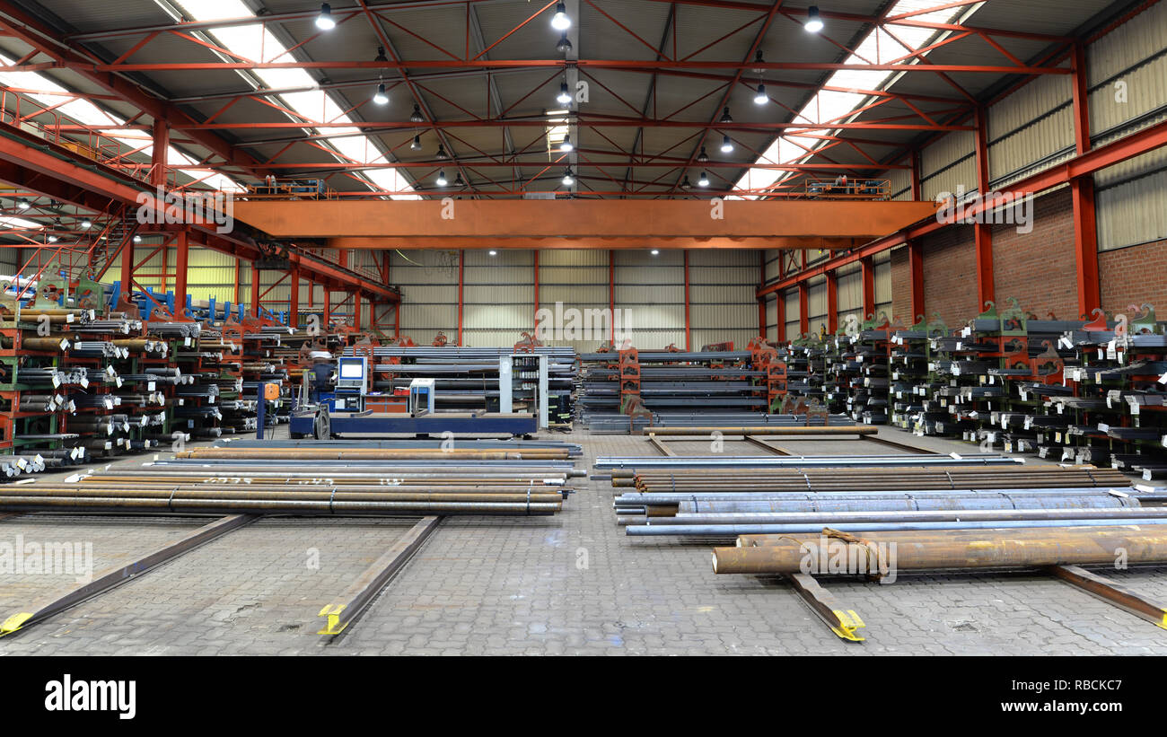 Sale and storage of industrial goods and steel in a factory hall Stock ...