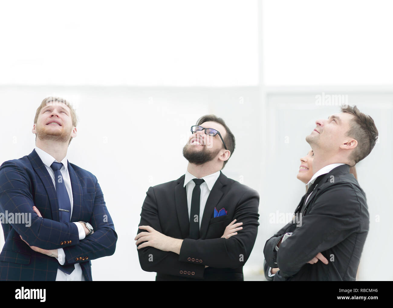 Successful business team looking upwards hi-res stock photography and ...