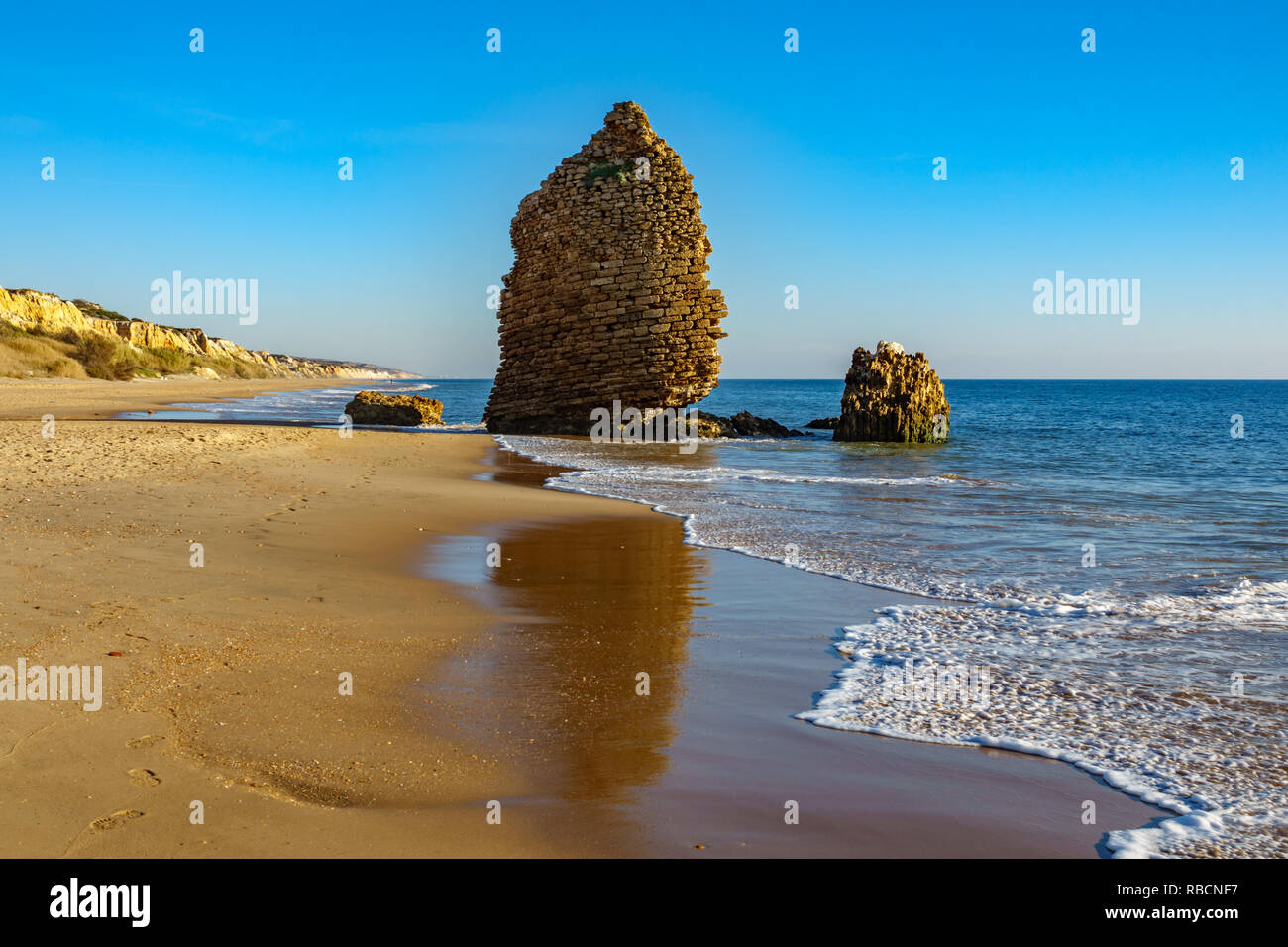 Old ruined defense tower near ocean in the beach Stock Photo - Alamy