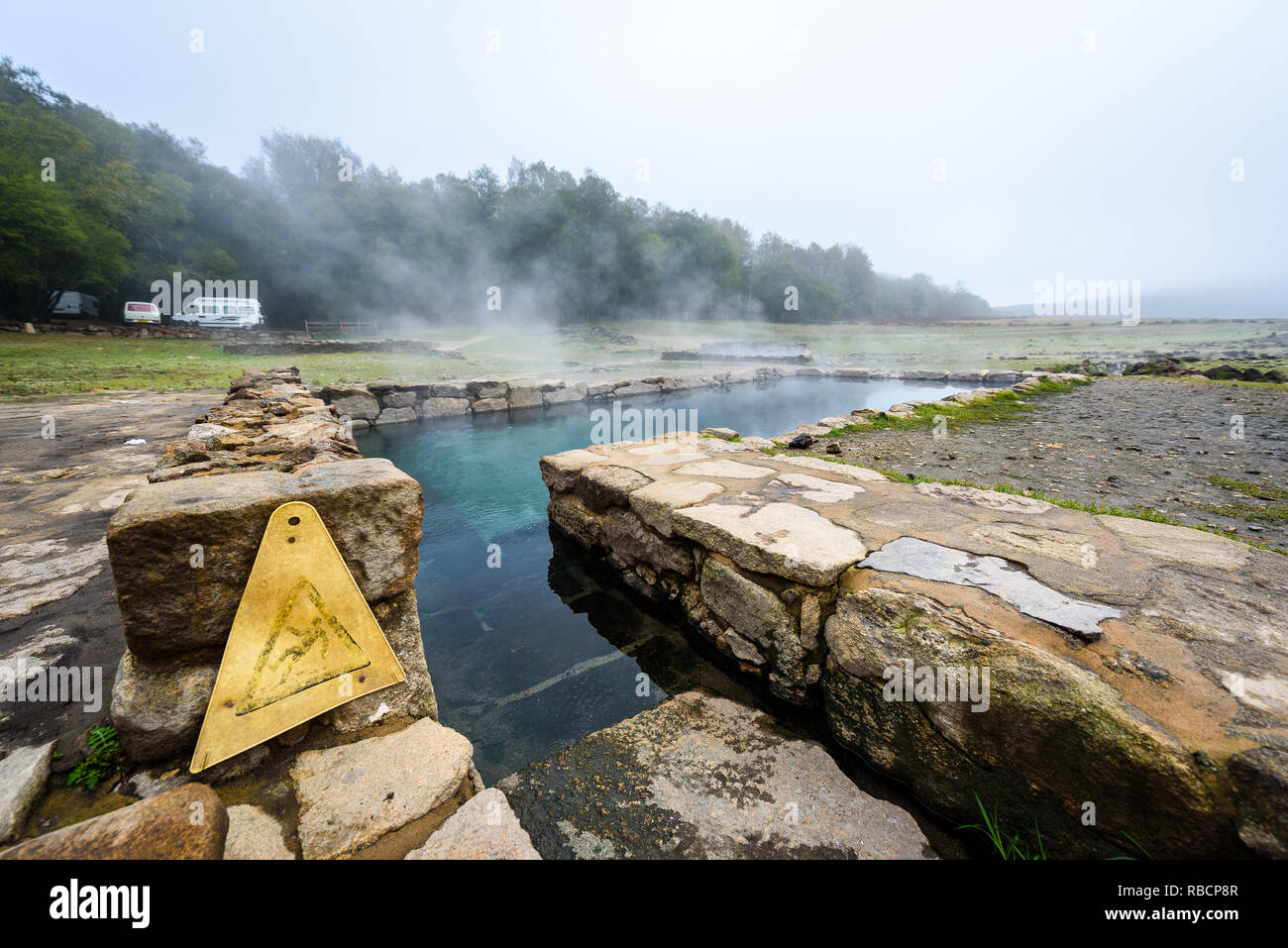 Natural Roman baths outdoors with hot steam and thermal water. Old ...