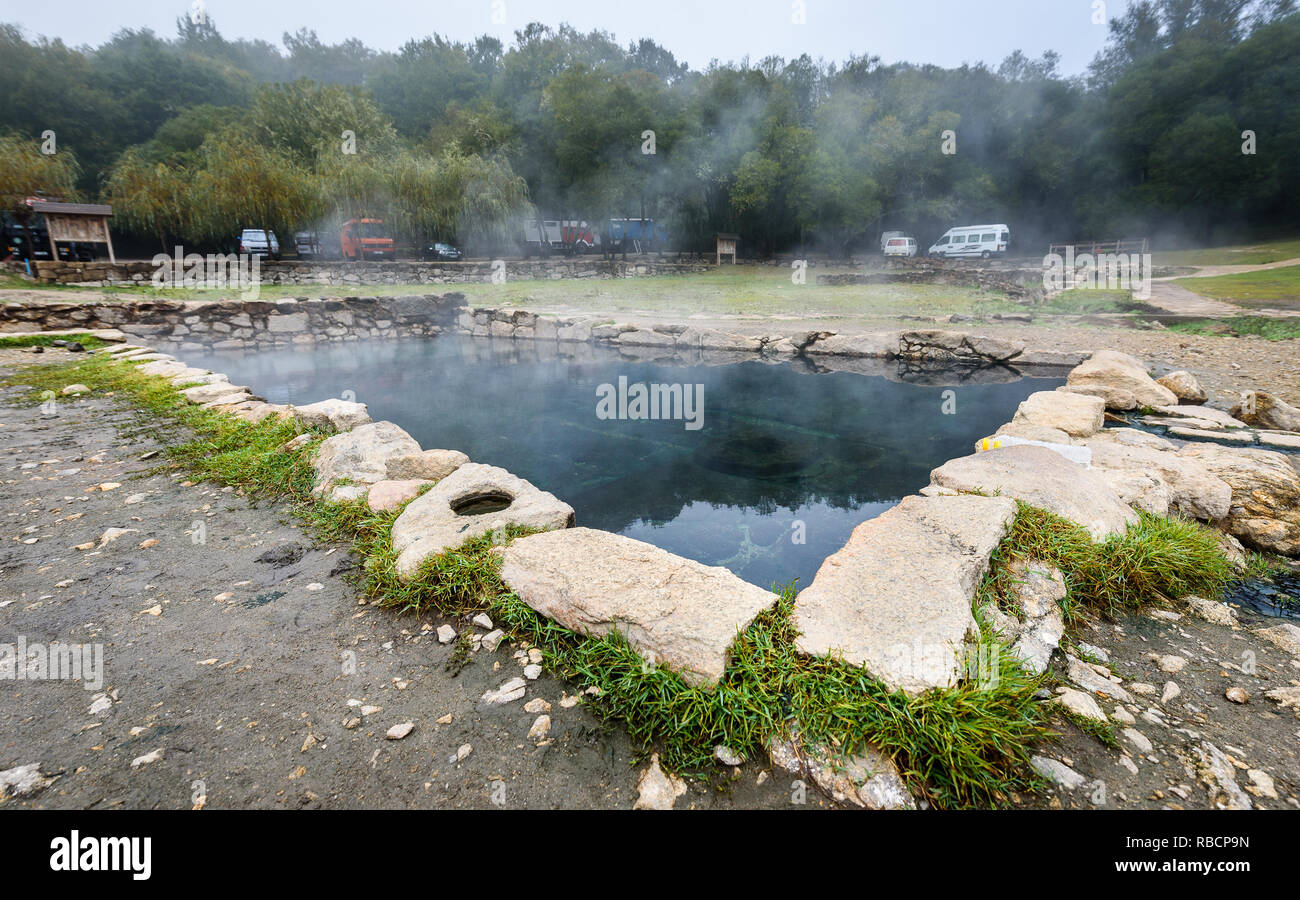 Natural Roman baths outdoors with hot steam and thermal water. Old ...
