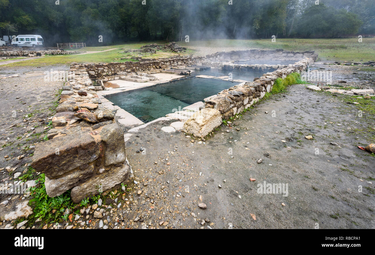 Natural Roman baths outdoors with hot steam and thermal water. Old ...