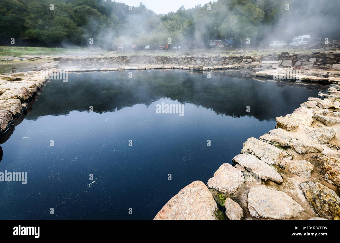 Natural Roman baths outdoors with hot steam and thermal water. Old ...