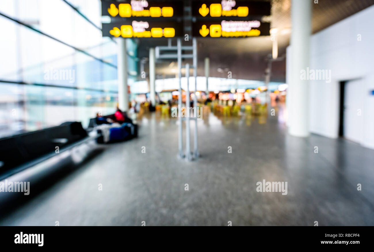 Abstract blurred picture of passengers waiting on the airport. Empty ...