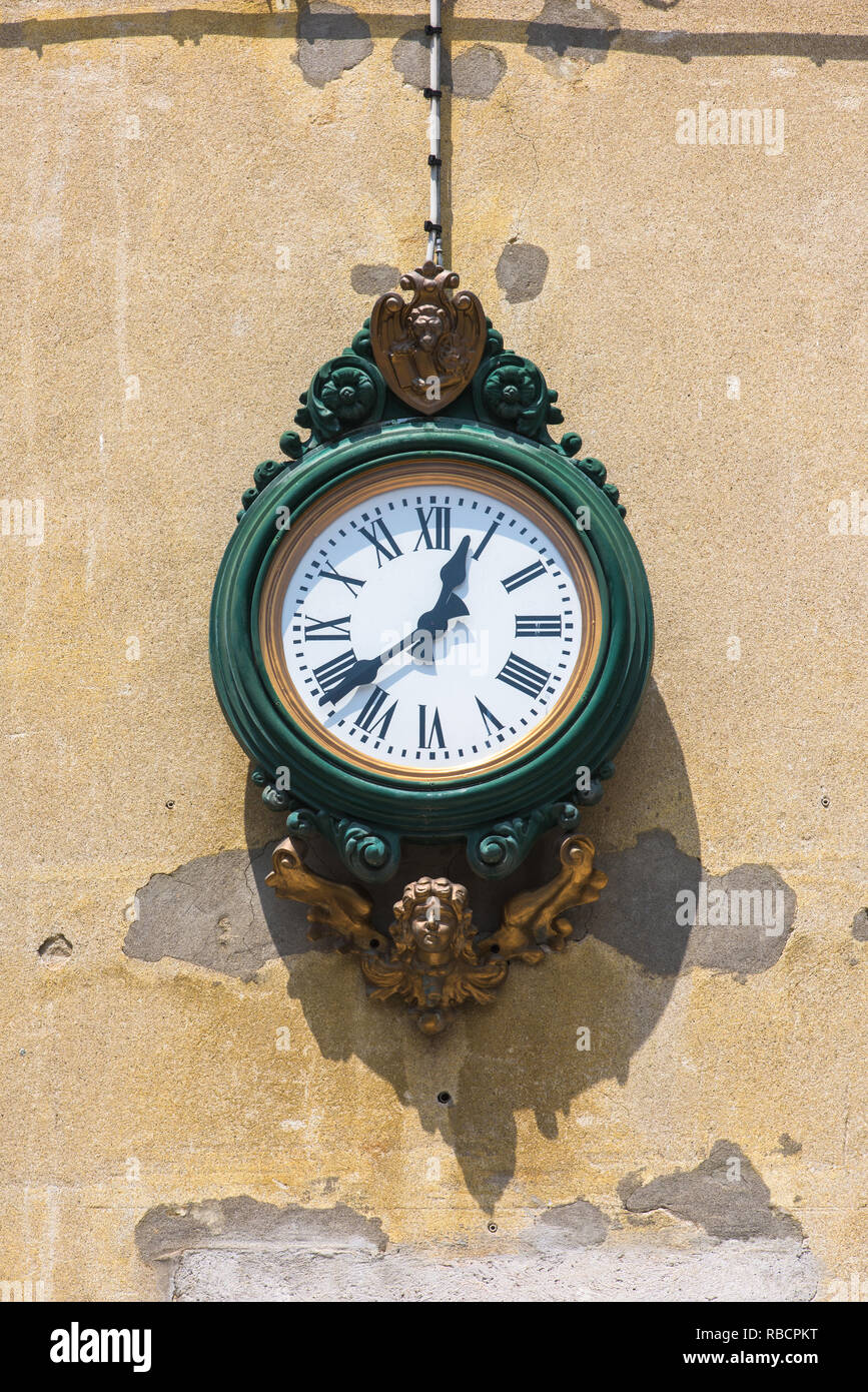 old antic wall clock in venice Stock Photo - Alamy