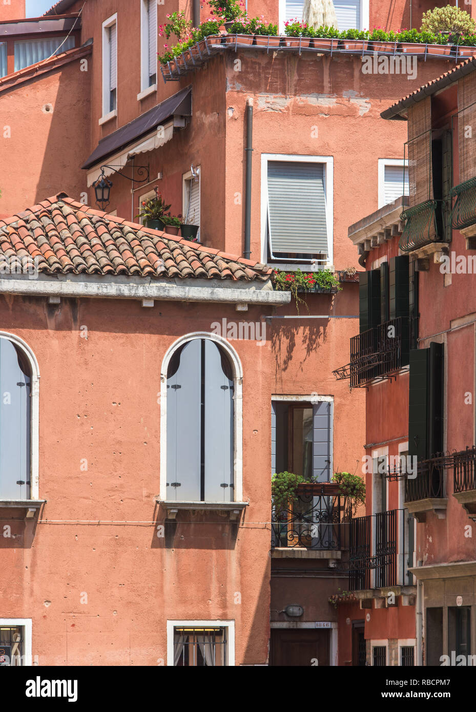 Red house window facade in venice Stock Photo - Alamy