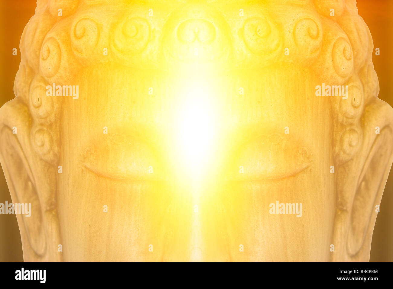 The figure of a Buddha with a bright light forehead Stock Photo - Alamy