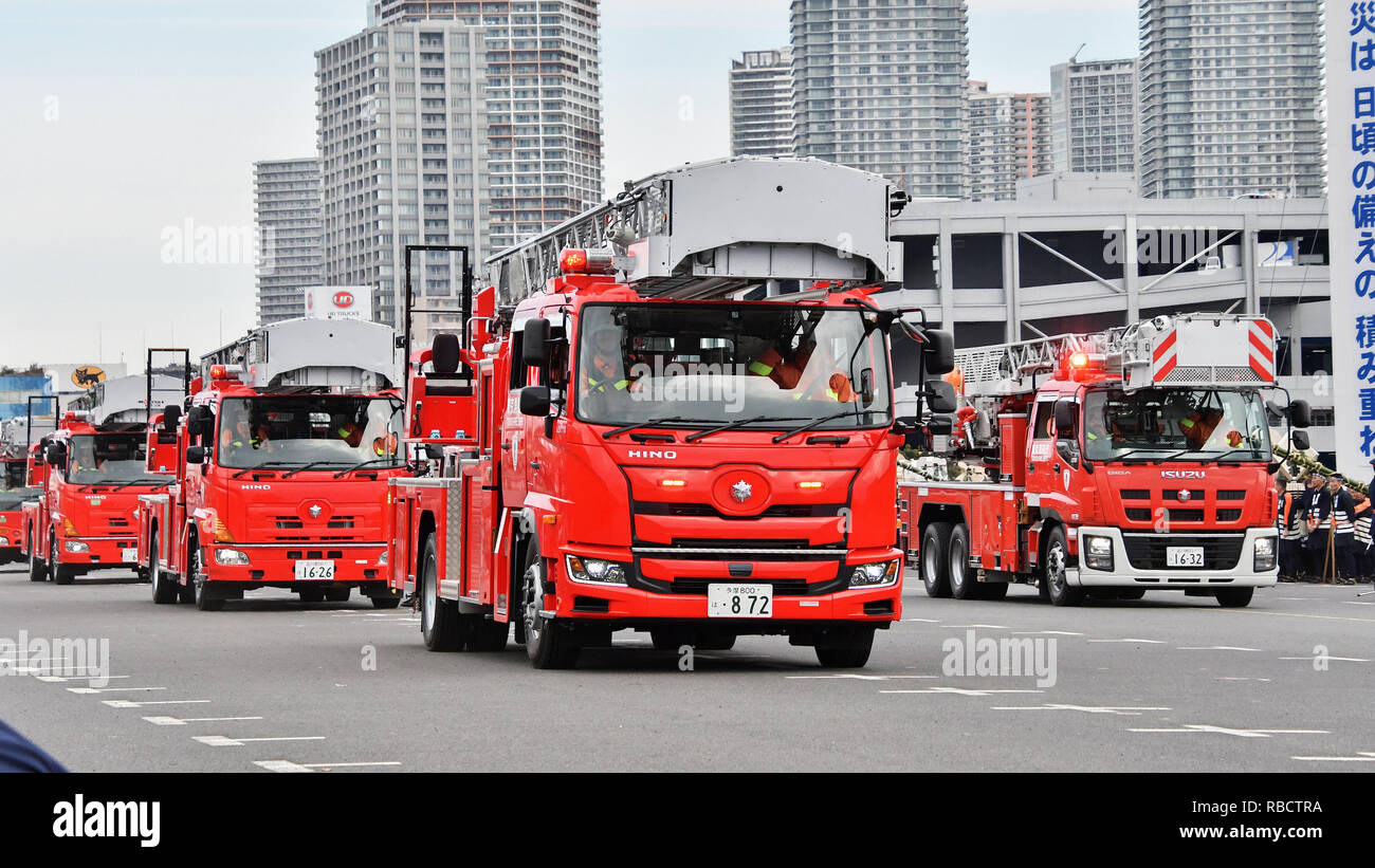 Tokyo Fire Department's ladder truck squad march at the New Year fire ...