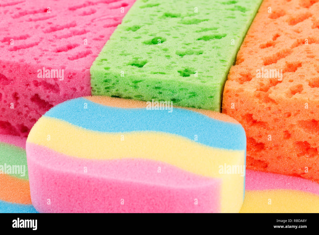 Colorful sponges closeup picture Stock Photo - Alamy