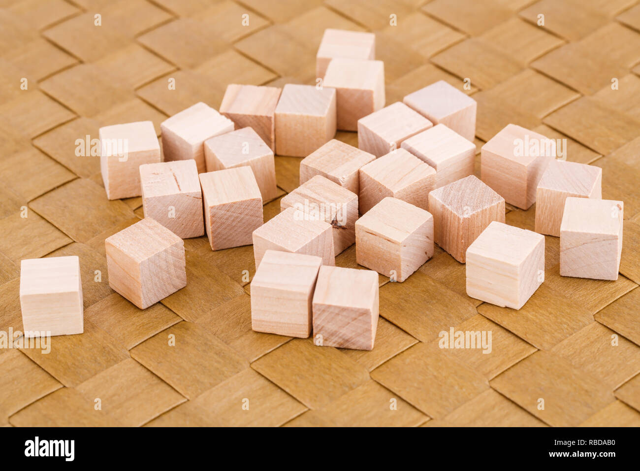 Wooden cubes on bamboo background Stock Photo - Alamy