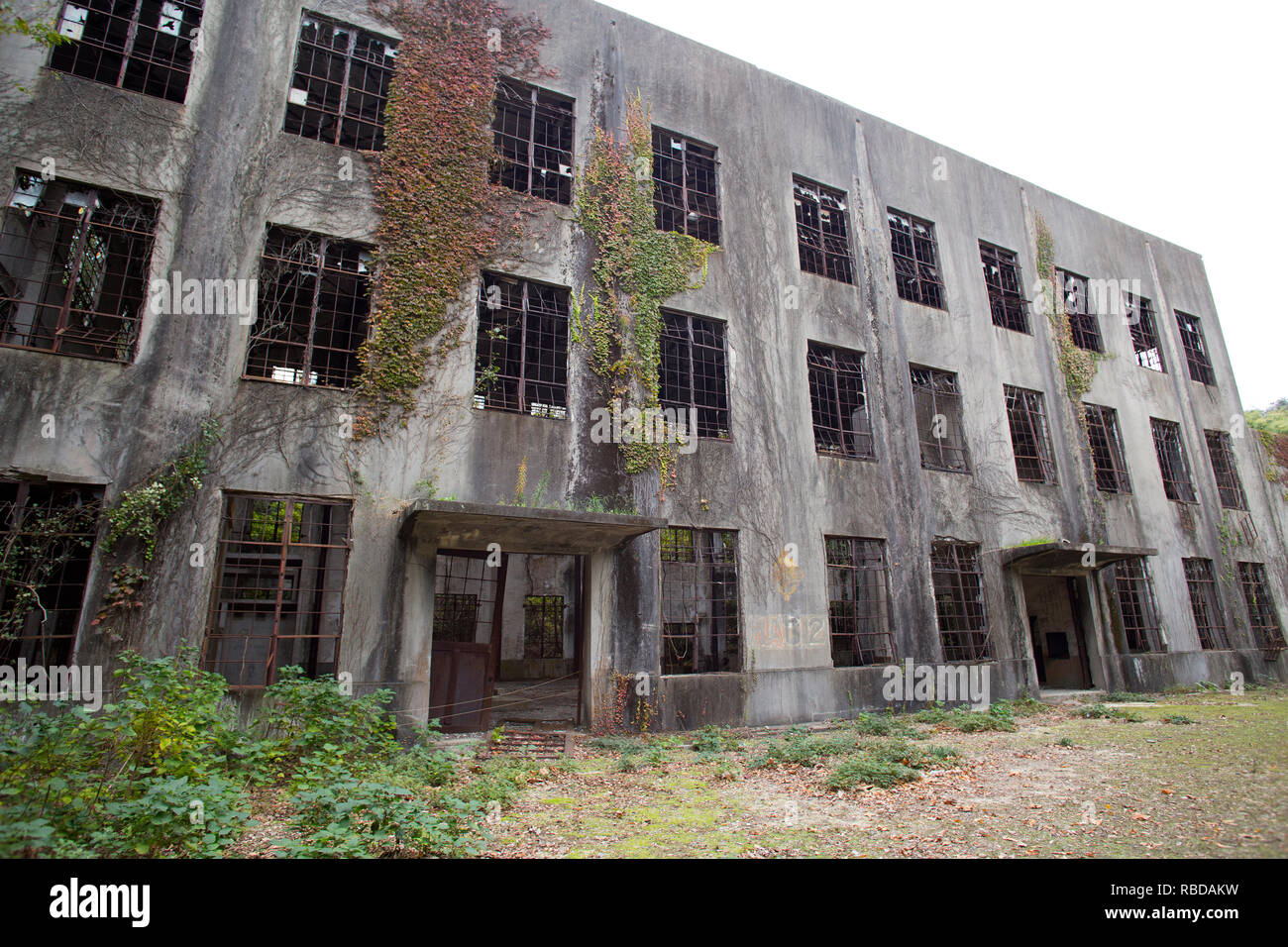 The ruins of the power plant in Okunojima island in Takehara, Hiroshima ...