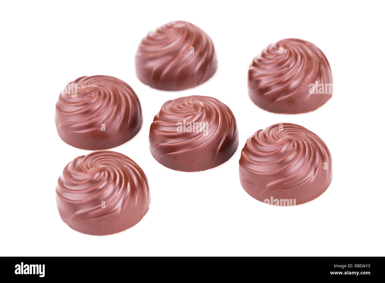 Heap of chocolate isolated on white background Stock Photo - Alamy