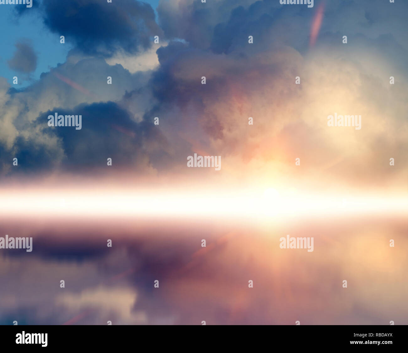 Amazing sunset picture with clouds, against sun rays reflected on the ...