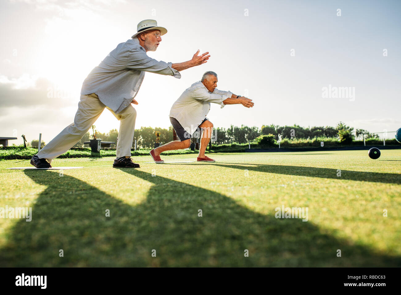 Ball throwing elderly hi-res stock photography and images - Alamy