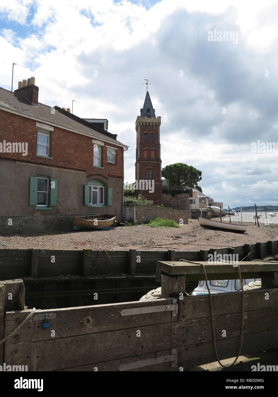 view of beach and peters tower in Lympstone Devon Stock Photo - Alamy