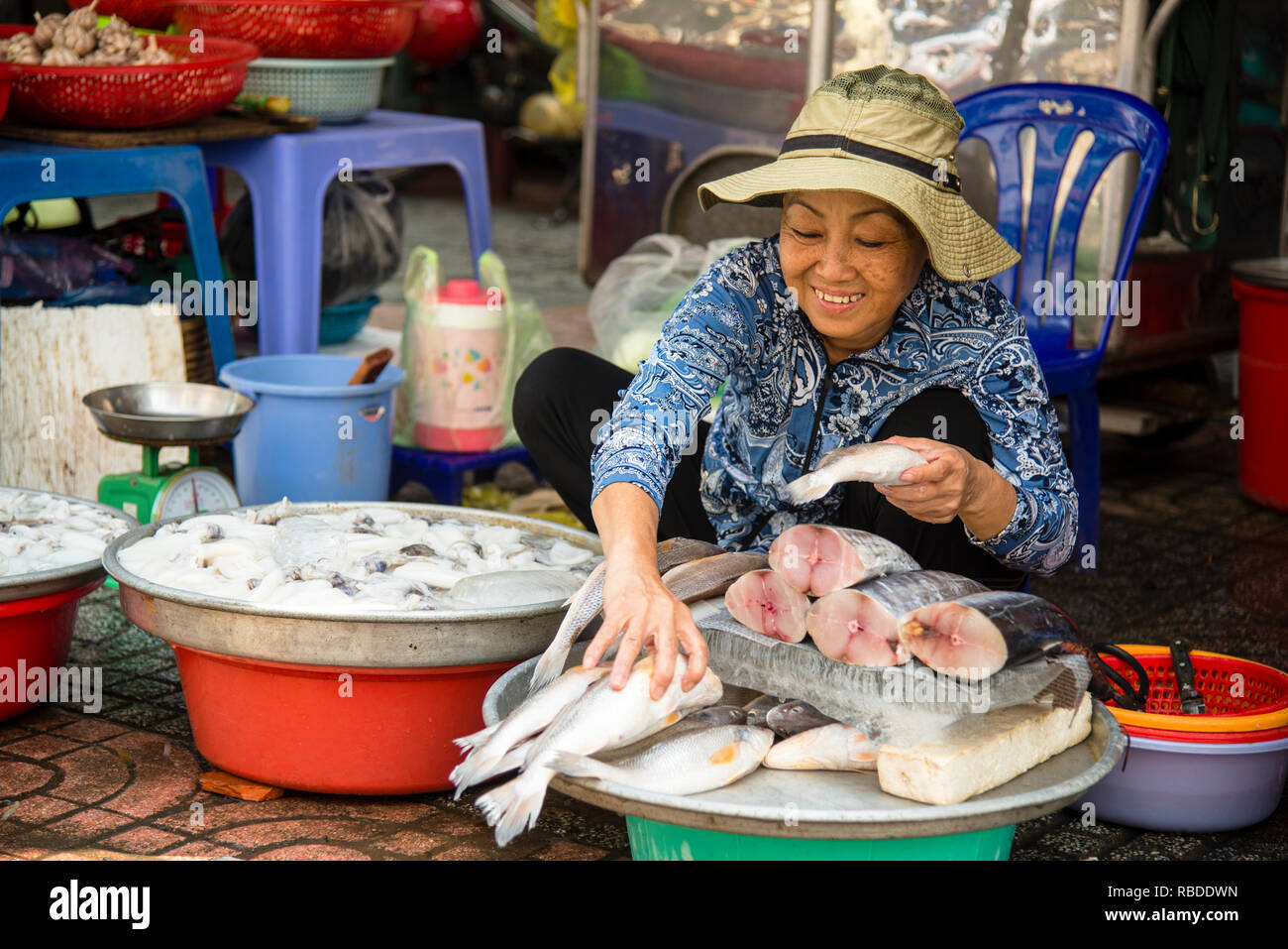 Fish vendor in Saigon, Vietnam Stock Photo - Alamy