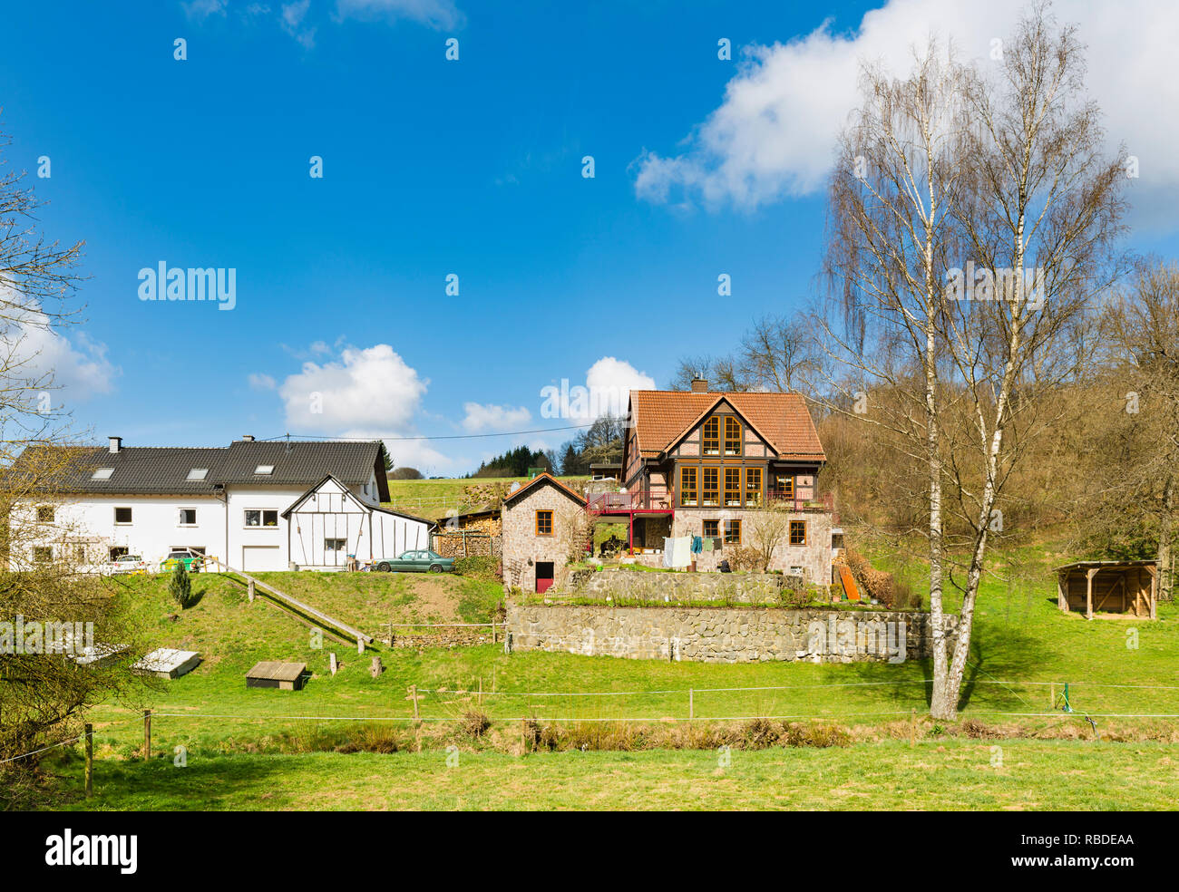 A beautiful house in the Eifel hills in Daun, Germany in spring Stock ...