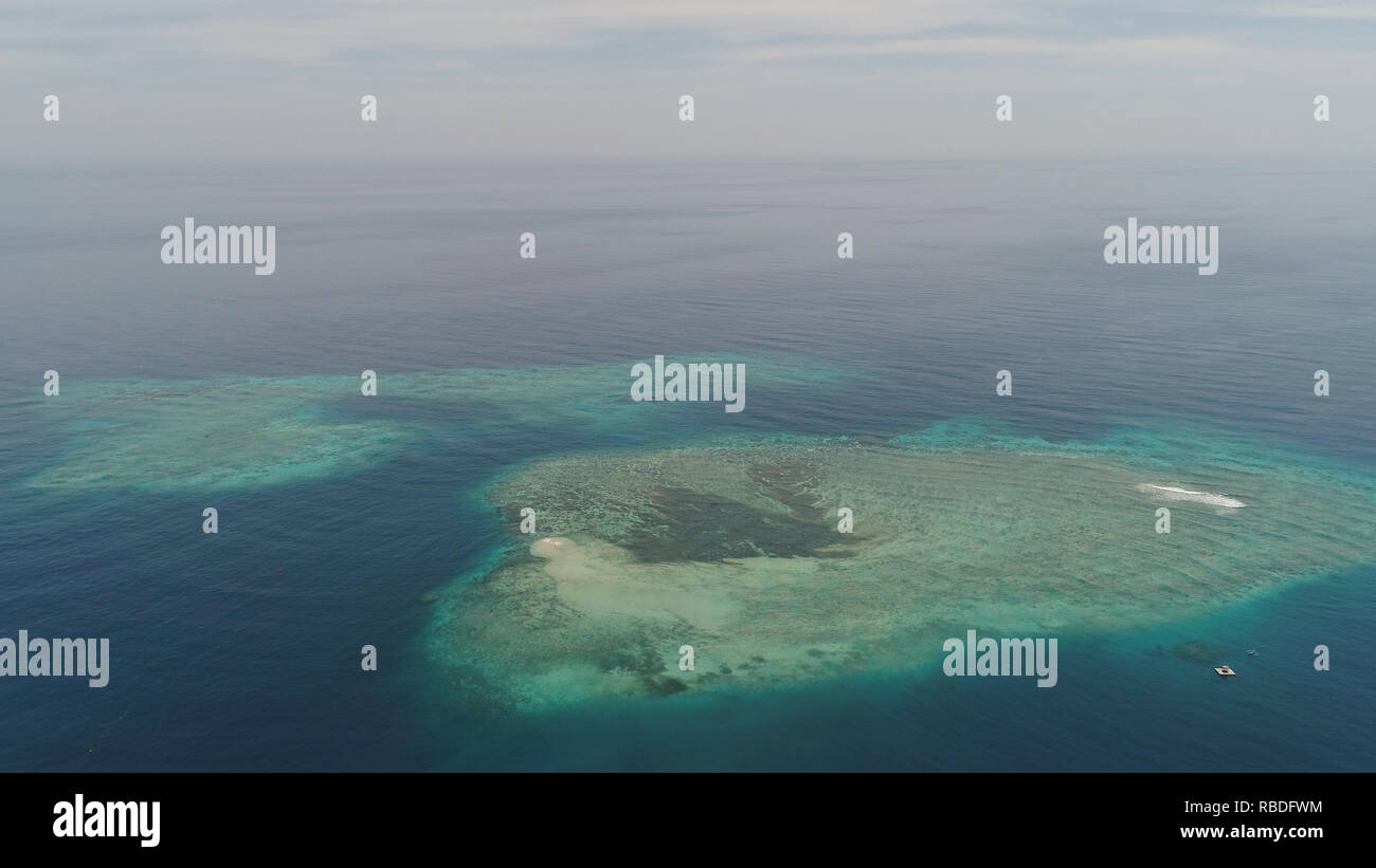 seascape aerial view coral reef, atoll with turquoise water in sea ...