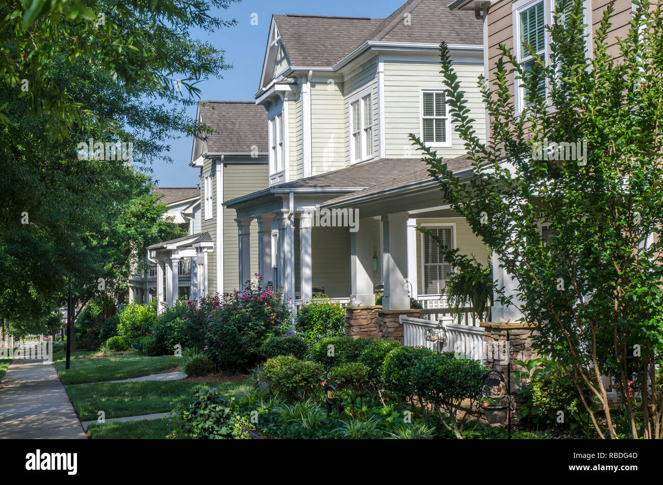 Row of Victorian-style Homes in a Surburban Neighborhood Stock Photo ...