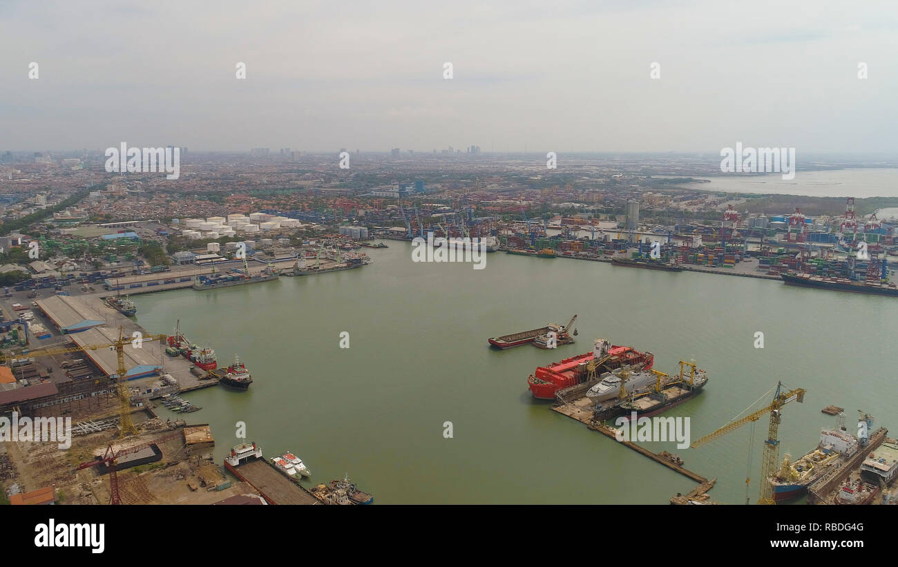 aerial view cargo and passenger seaport with ships and crane Tanjung ...