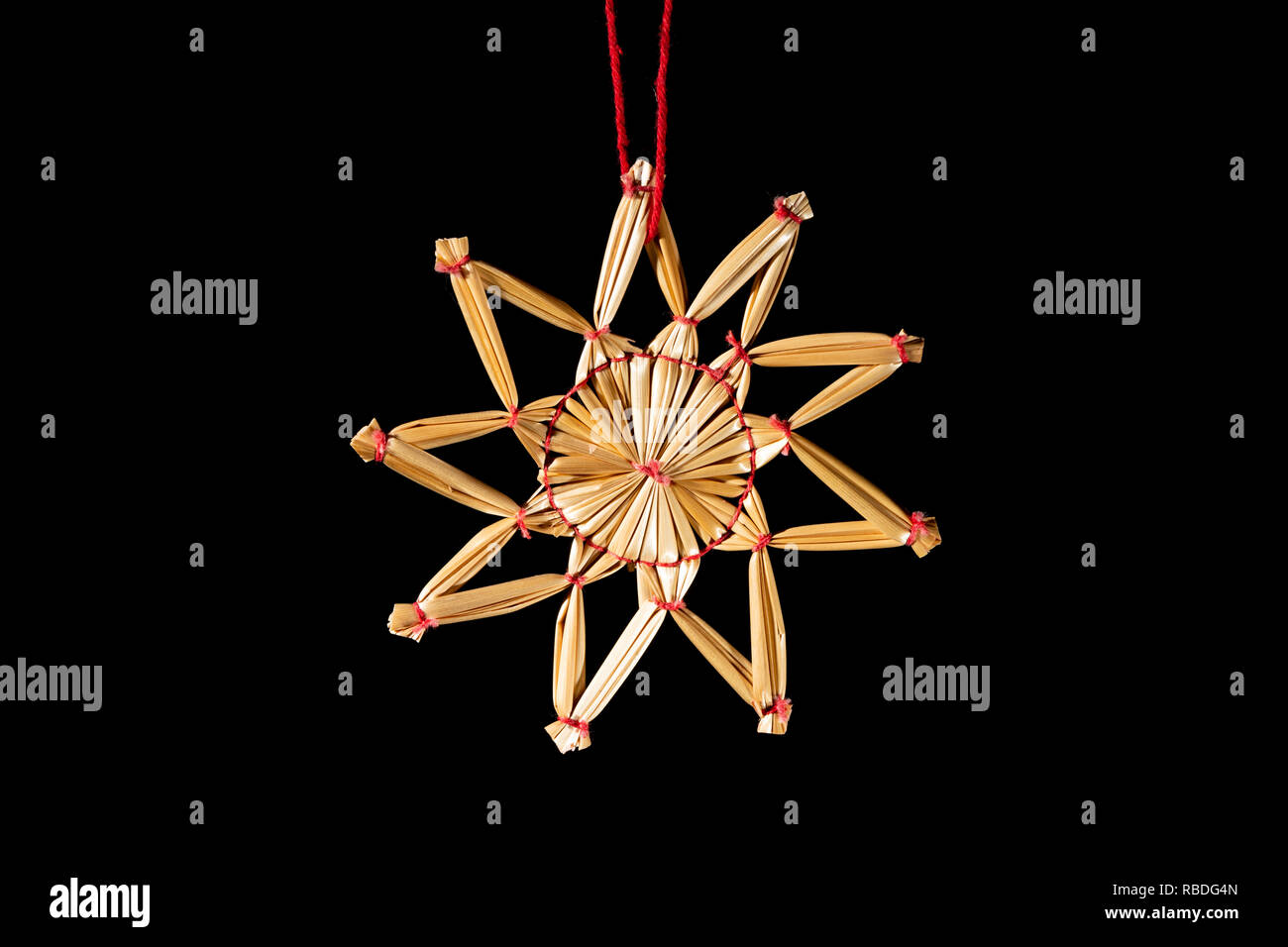 Handmade straw star used for decorating a christmas tree, black ...