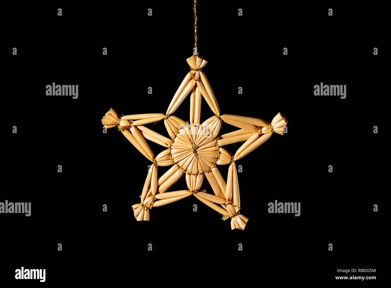 Handmade straw star used for decorating a christmas tree, black ...