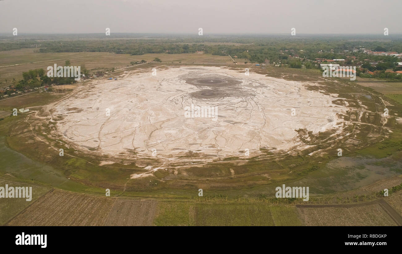 Mud volcano bledug kuwu. aerial view volcanic plateau with geothermal ...
