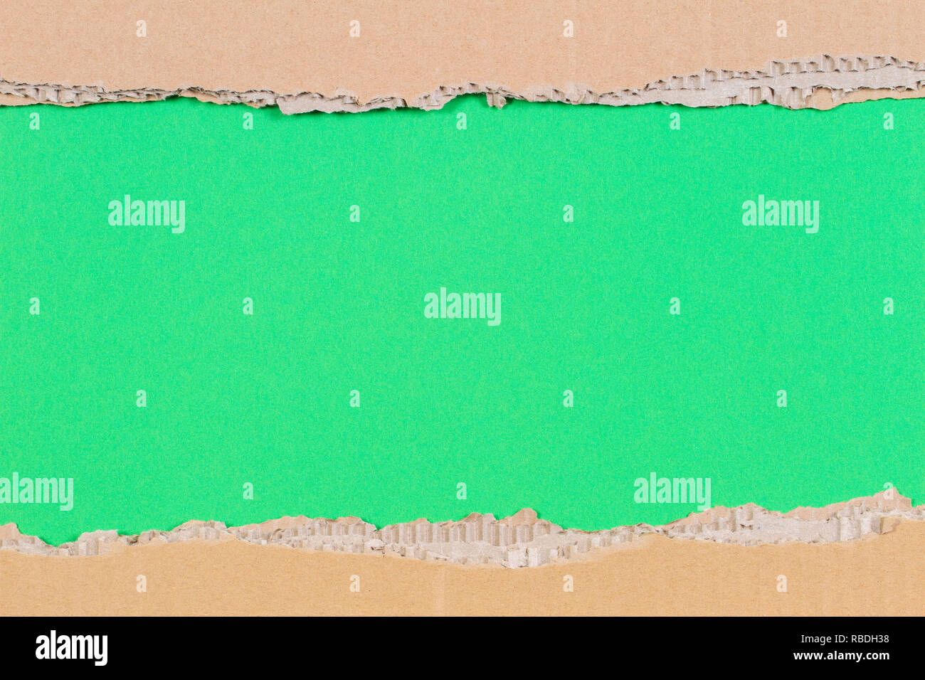 Brown corrugated cardboard ragged edge frame on yellow background Stock ...