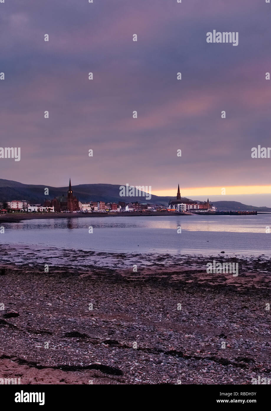 Sunset over the town of Largs with its Church Steeples and busy town ...
