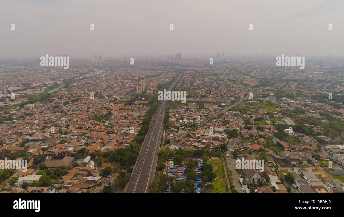 Aerial cityscape modern city Surabaya with skyscrapers, buildings and ...