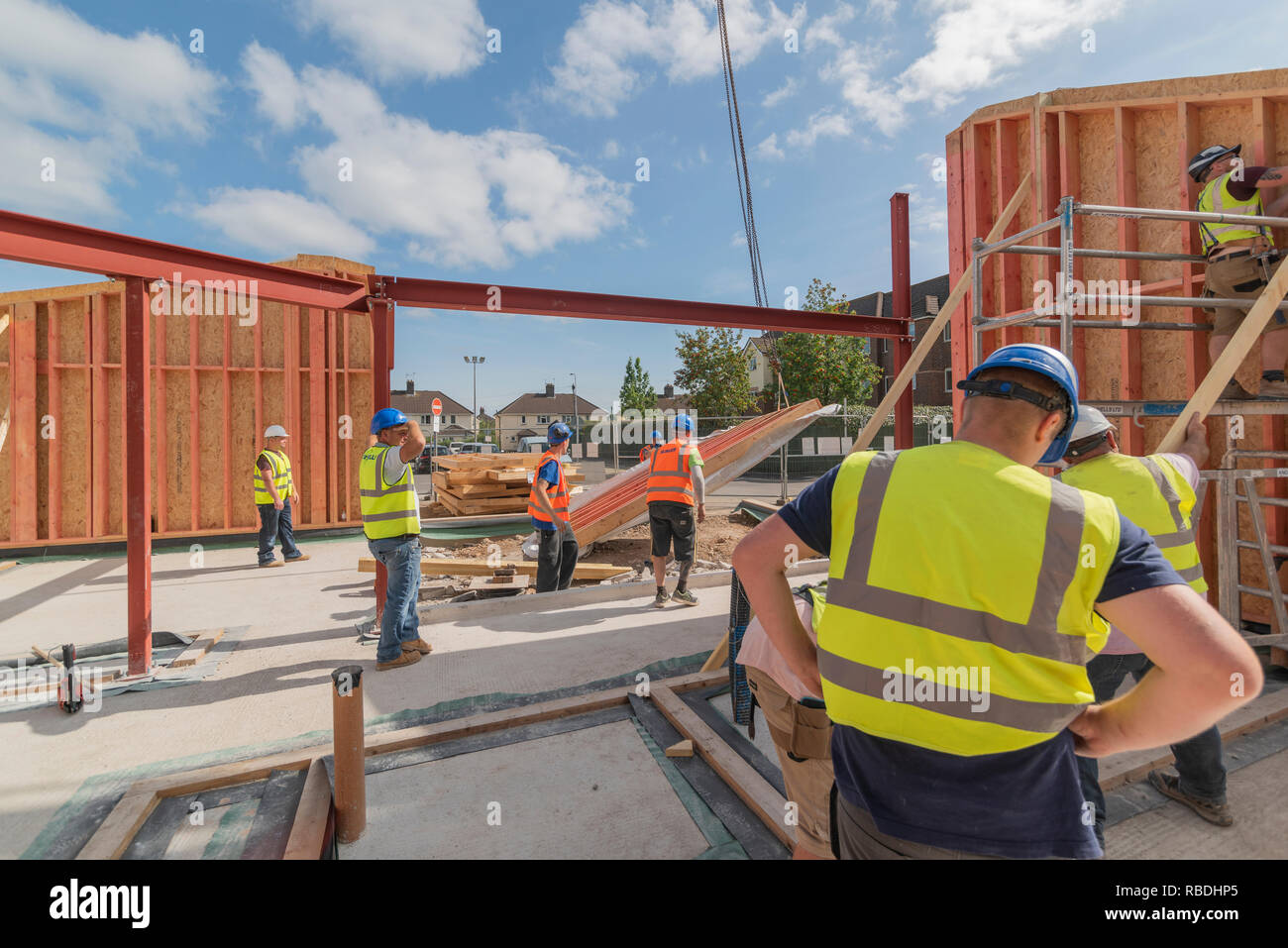 Wood paneling being installed at Maggies Life Centre, Velindre Hospital ...
