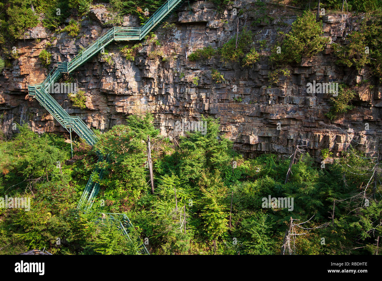 Stairs climbing a sheer cliff face at AuSable Chasm in Keesville Chasm ...