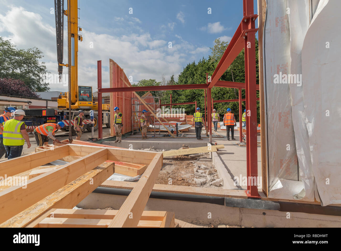 Wood paneling being installed at Maggies Life Centre, Velindre Hospital ...
