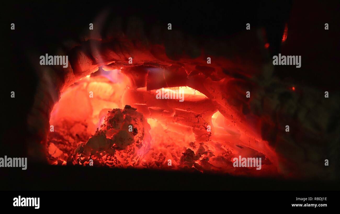 Beautiful hot fire burning in a fireplace Stock Photo - Alamy