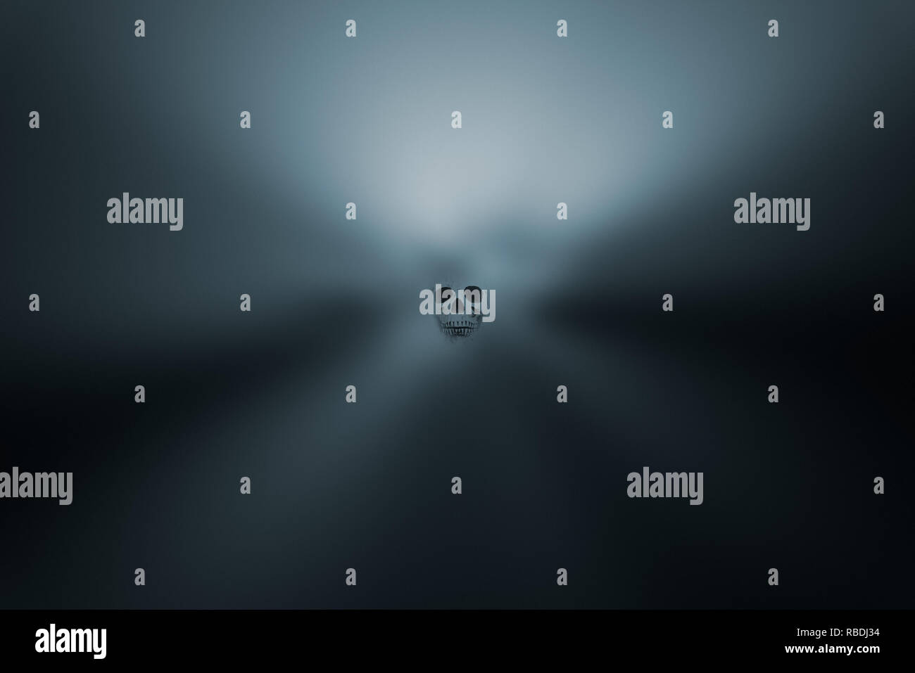 Spooky abstract halloween blue background with skull Stock Photo - Alamy