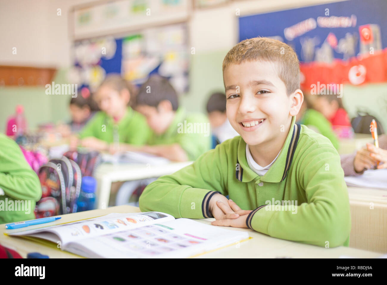 male student at the class smiling Stock Photo - Alamy