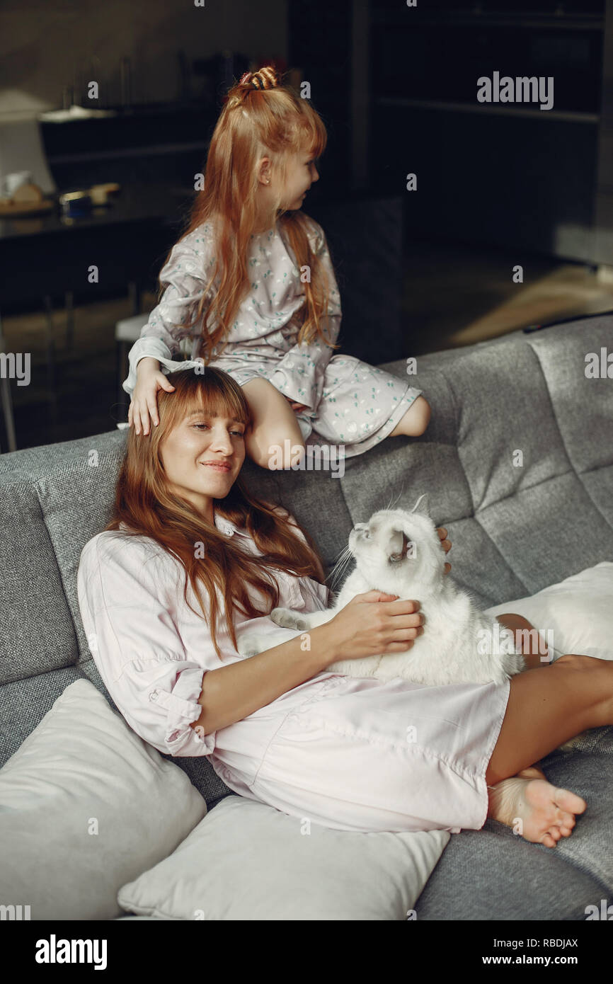 Mother with daughter at home Stock Photo - Alamy