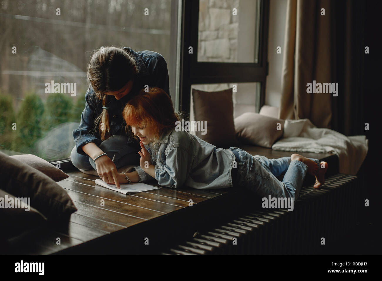 Two sisters at home Stock Photo - Alamy
