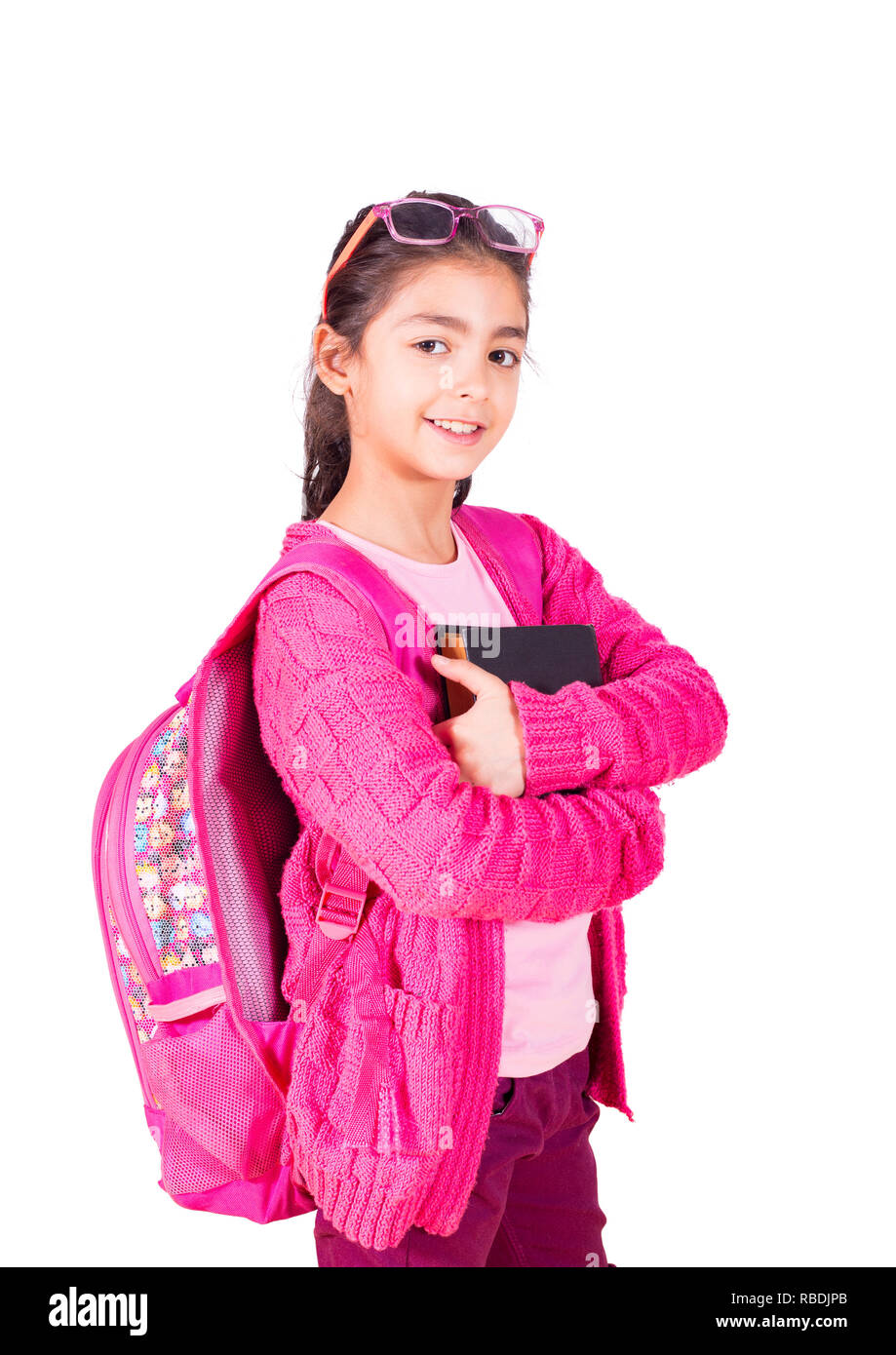 Elementary school girl student smiling and looking Stock Photo - Alamy