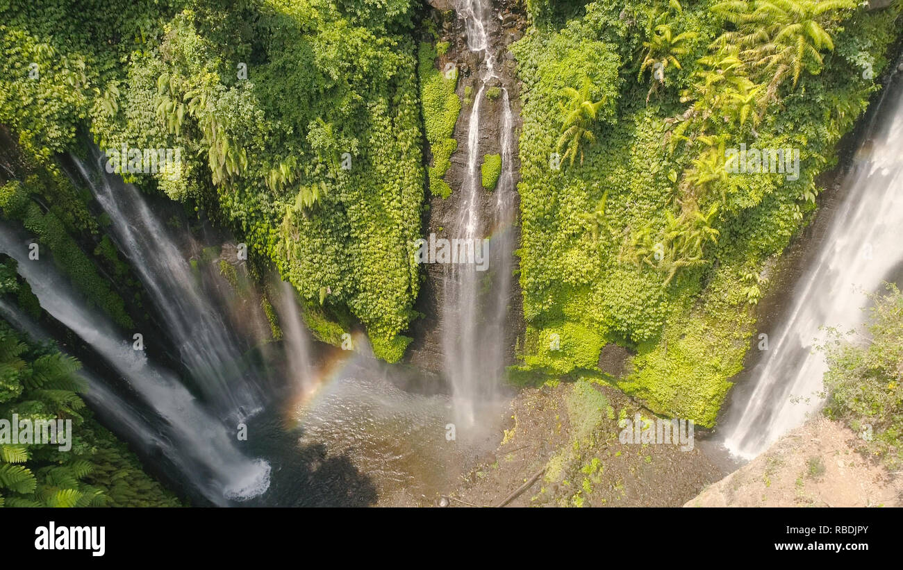 waterfall in green rainforest. Aerial view triple tropical waterfall ...