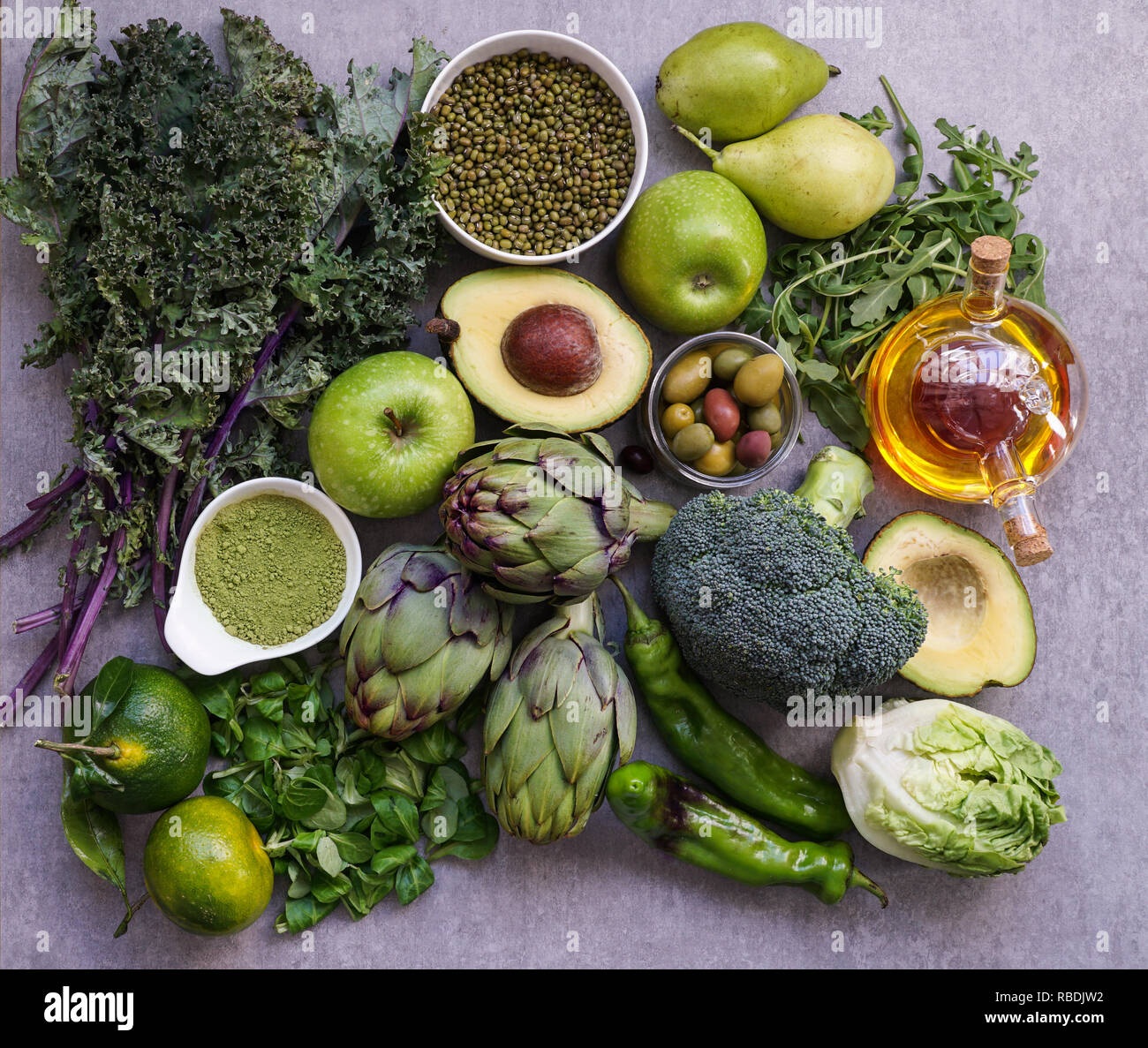 Healthy Green food selection for vegetarians: avocado, apples, broccoli ...