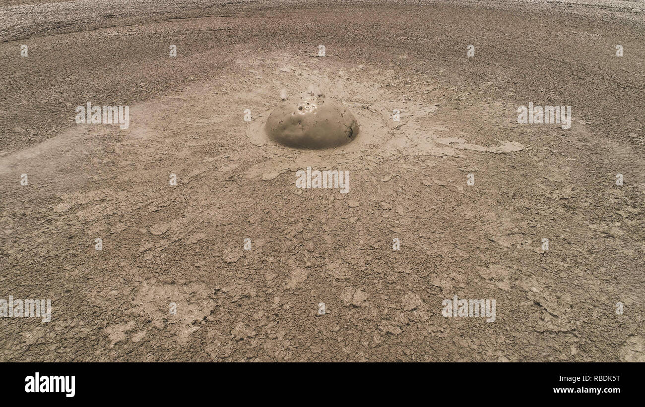 Mud volcano bledug kuwu. aerial view volcanic plateau with geothermal ...