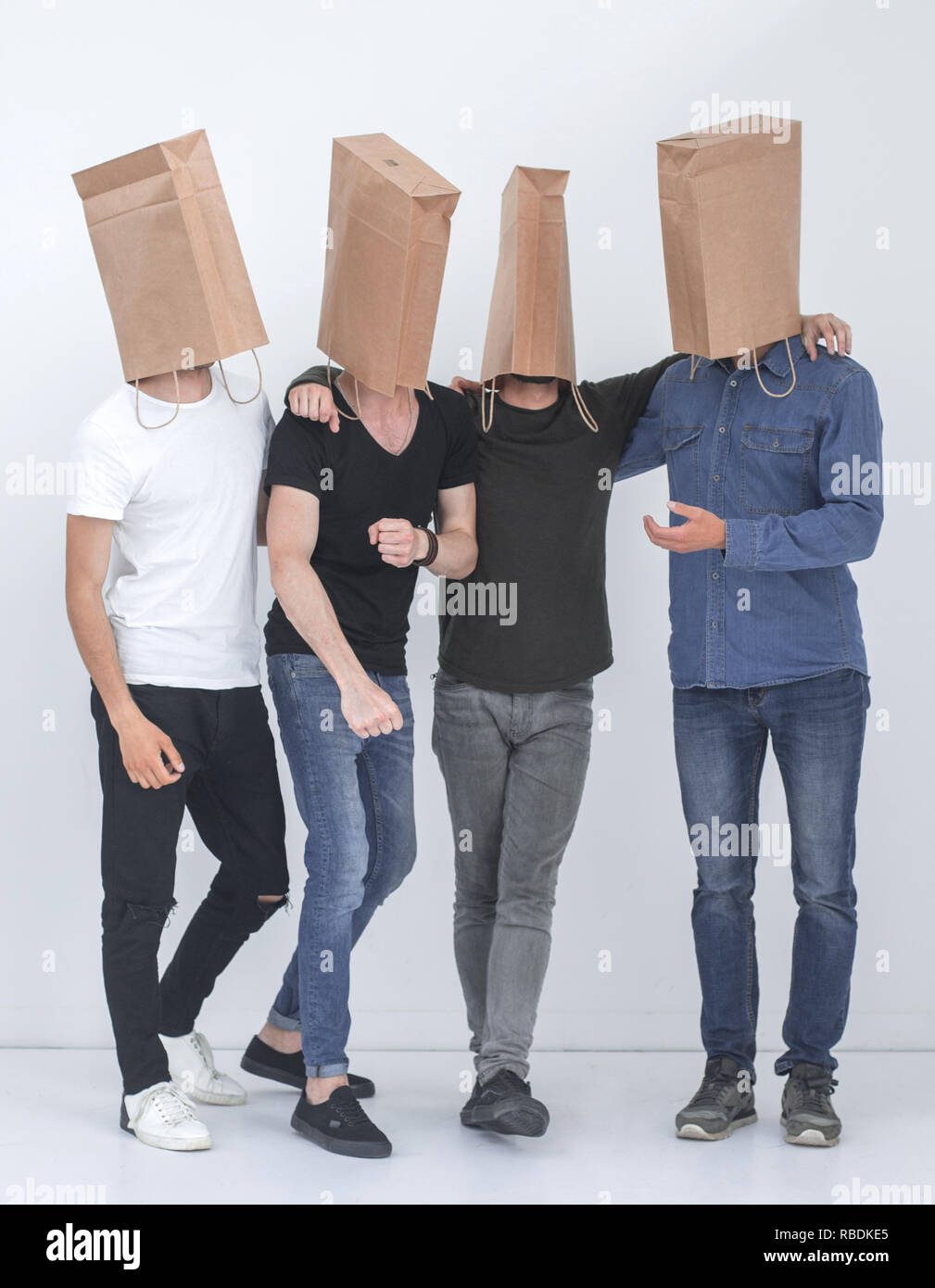 group of men with paper bags on their heads Stock Photo - Alamy
